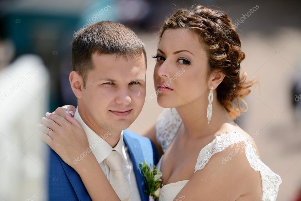 Beautiful Wedding couple hugging Stock Photo by ©pvstory 103830434
