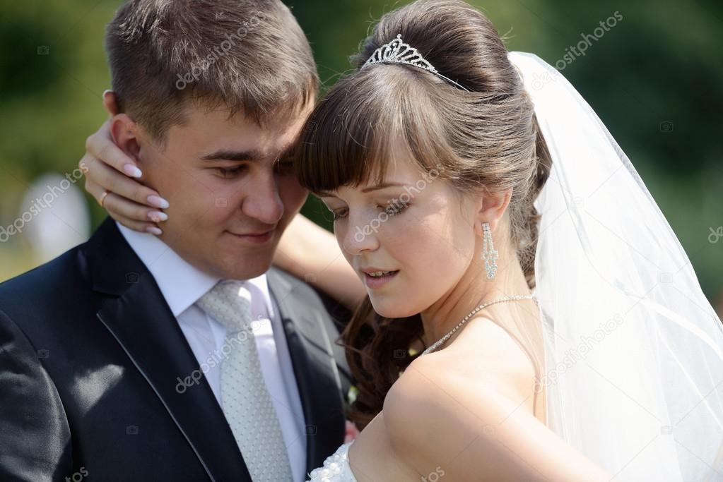 Beautiful wedding couple hugging Stock Photo by ©pvstory 106615140