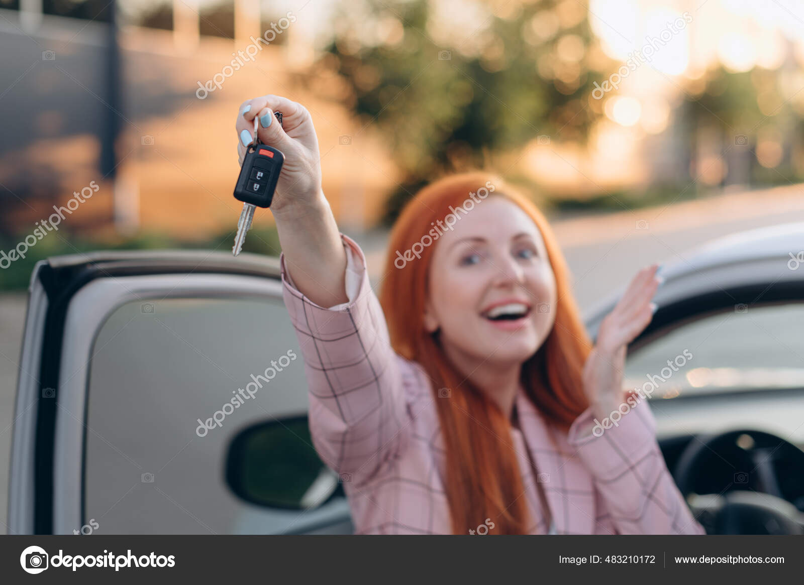 Woman won a car. Stock Photo by ©ielanum.yandex.ru 483210172