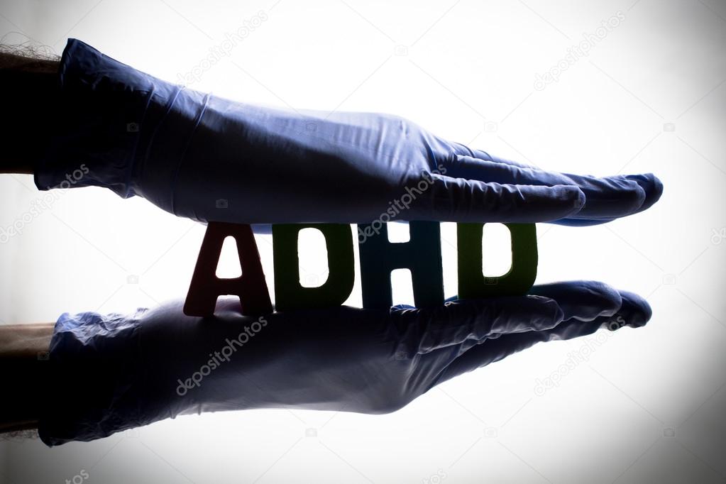 Word ADHD in outstretched hands Stock Photo by ©lbrfzhjpf.gmail.com ...