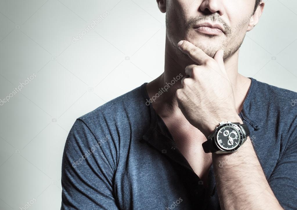Man with watch thinking — Stock Photo © kieferpix #117063896