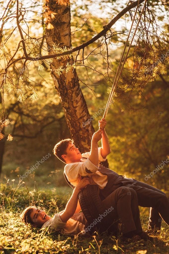 Twin brotherson swing — Stock Photo © Photo_life #106036940