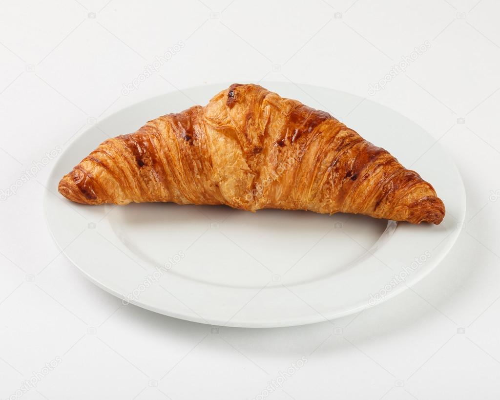 Croissant on the plate. Stock Photo by ©dmitriymoroz.gmail.com 107331418