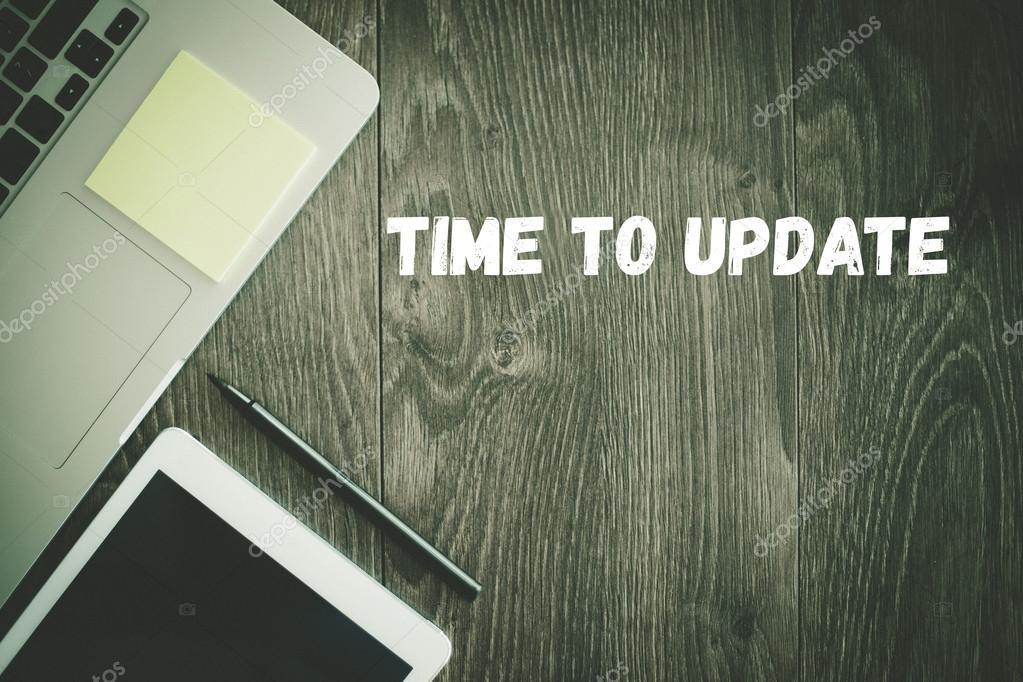 TIME TO UPDATE text on desk Stock Photo by ©garagestock 122553906