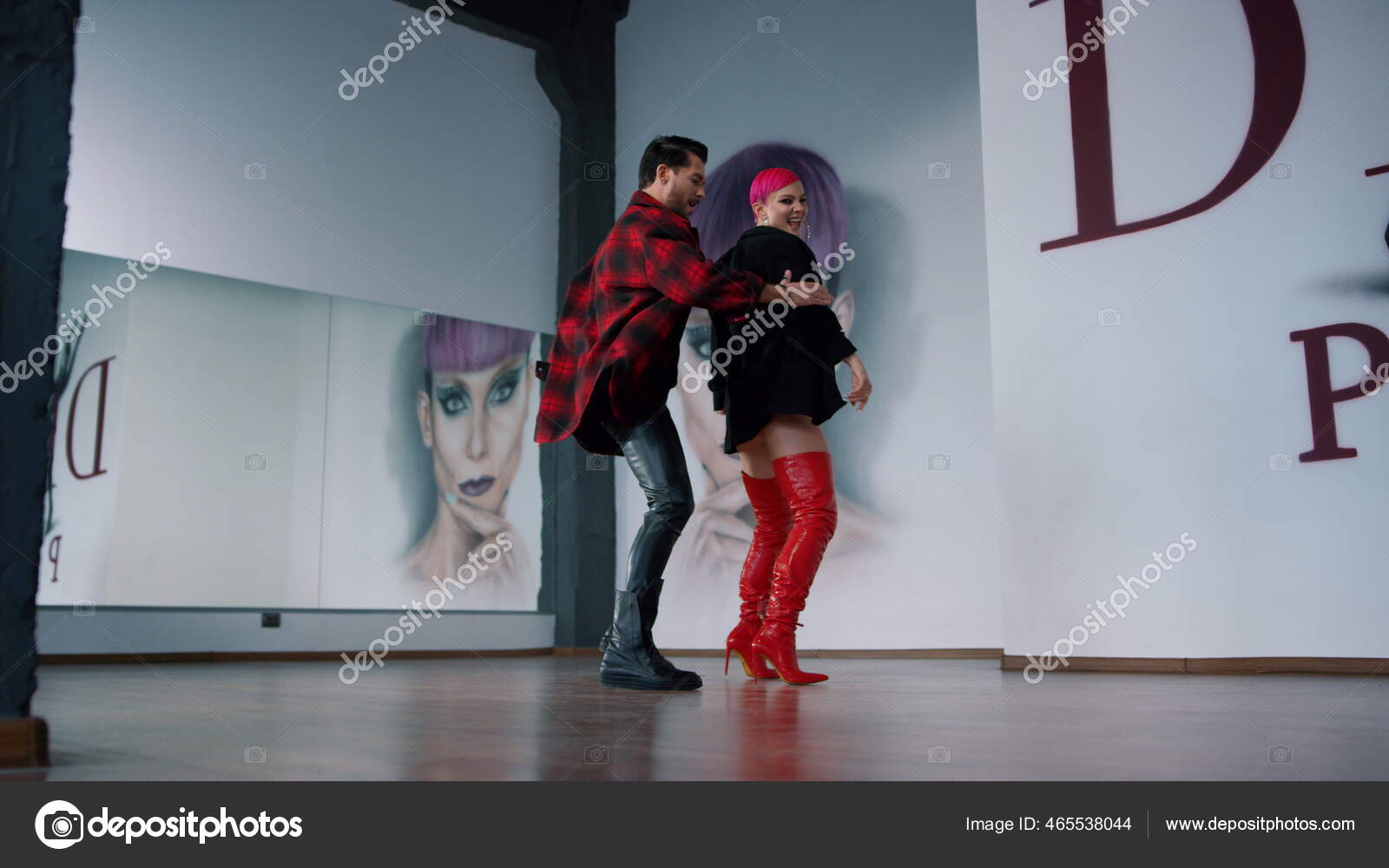 Sensual couple having dance class indoors. Man and woman dancing in ...