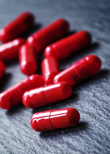 Red capsules Stock Photos, Royalty Free Red capsules Images | Depositphotos