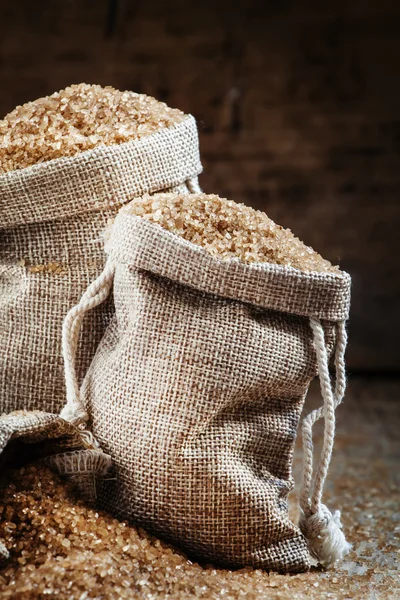 Brown sugar, packed in bags — Stock Photo © 5PH #108134262