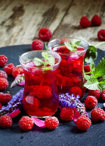 Hot red tea with raspberries - Stock Image - Everypixel