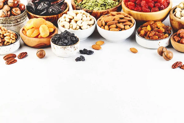 Nuts Dried Fruits Assortment Dry Apricots Figs Raisins Walnuts Almonds Stock Photo by ©5PH 540029206