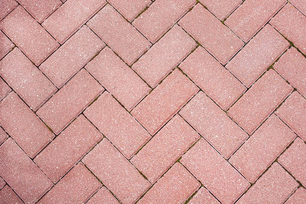 Red brick pavement background — Stock Photo © llawenydd@mail.ru #106651412