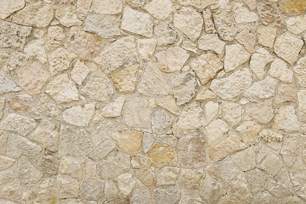 Old beige stone wall background texture — Stock Photo © llawenydd@mail ...