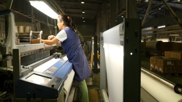 Woman fixing machine at textile factory — Stock Video © tmbstudio1 ...