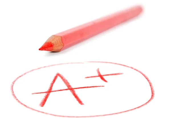 Mark A+ with red pencil Stock Photo by ©OlyPhotoStories 110312978