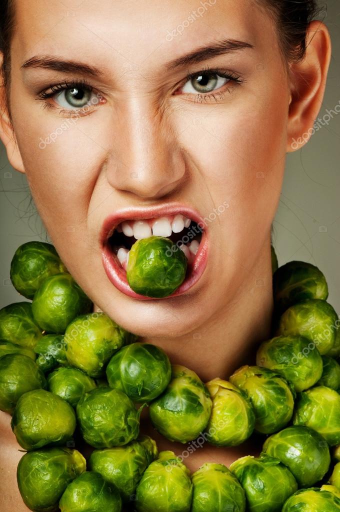 Beautiful woman with Brussels sprouts — Stock Photo © SvetlanaFedoseeva ...