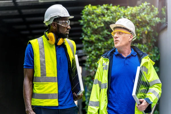 team factory worker technician engineer men in green working suit dress ...