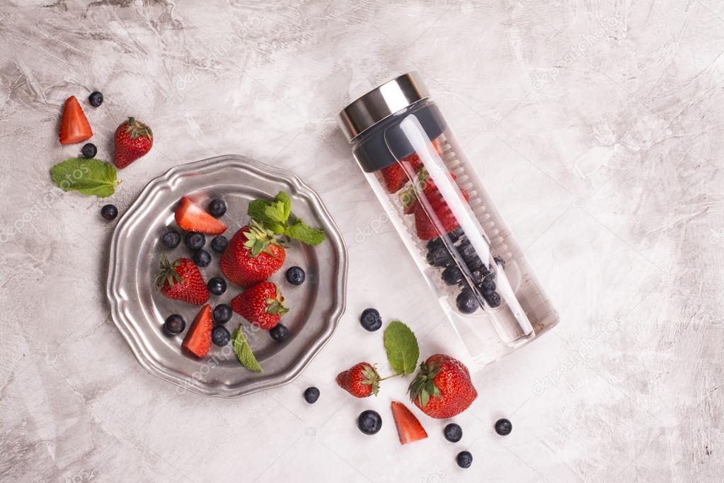 Infused water in glass bottle and fresh berries Stock Photo by ©happy ...