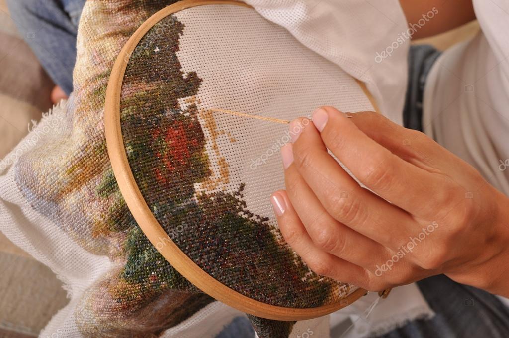 Cross stitch process close-up Stock Photo by ©andreibaryla 120637232