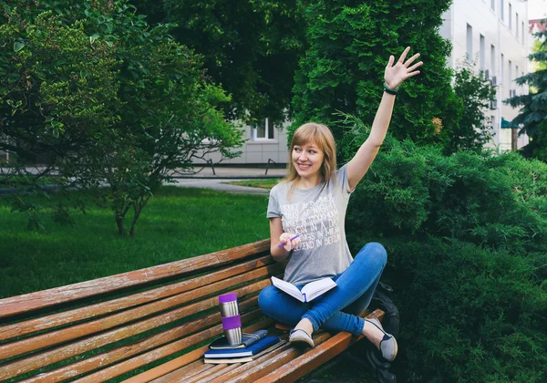 Student studying in park - Stock Image - Everypixel