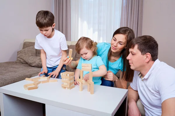 Family at the table playing board games. - Stock Image - Everypixel