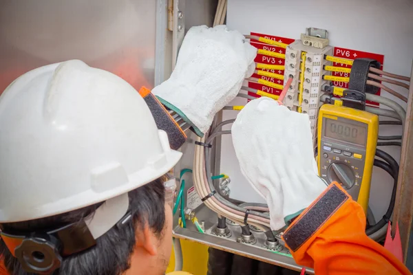 Electrician using the digital multimeter - Stock Image - Everypixel