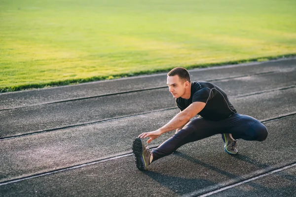 man stretches the body - Stock Image - Everypixel