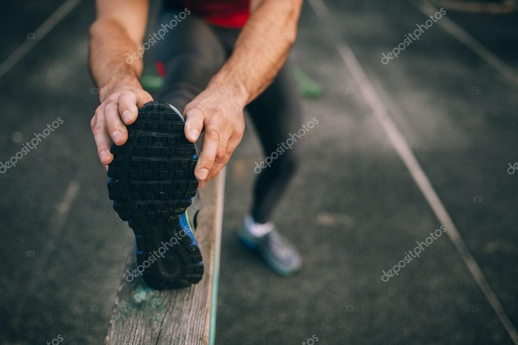 Male stretching before workout — Stock Photo © Amvorsuf #111543266