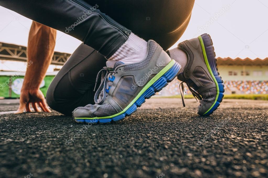 Sprinter legs on the start — Stock Photo © Amvorsuf #111543286