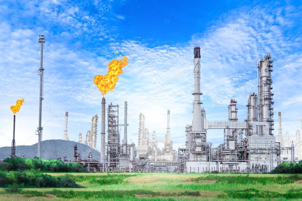 Oil and gas refinery plant with with flare stack on blue sky background Stock Photo by ©Tryaging ...