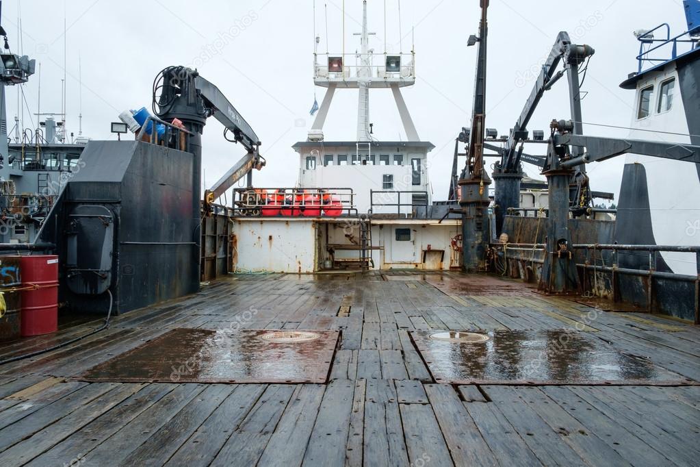 Commercial fishing boat deck with two hatches Stock Photo by ...