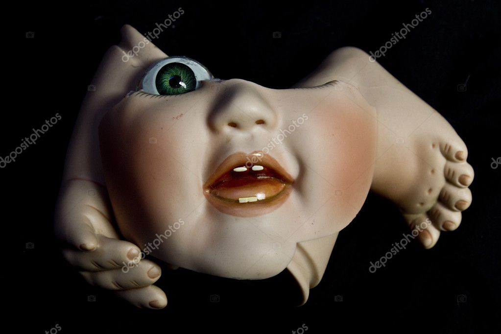 Close Up of Broken Doll Heads and Parts On Black Background — Stock ...