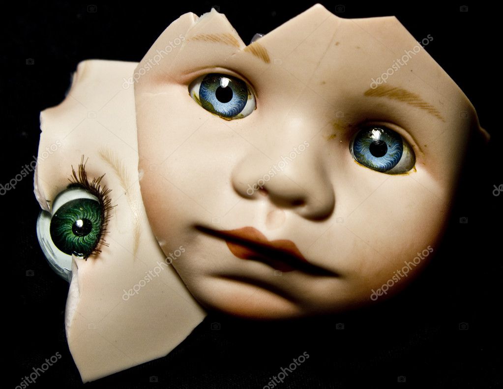 Close Up of Broken Doll Heads and Parts On Black Background Stock Photo ...