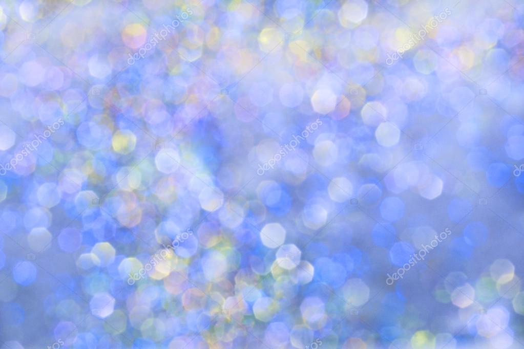 Abstract blue glitter bokeh background. Defocused hexagon prism lights ...