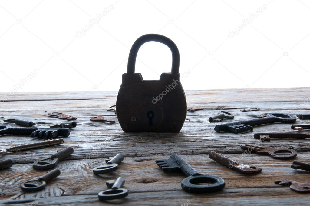 Old rusty padlock and keys on white wooden table — Stock Photo © monika ...