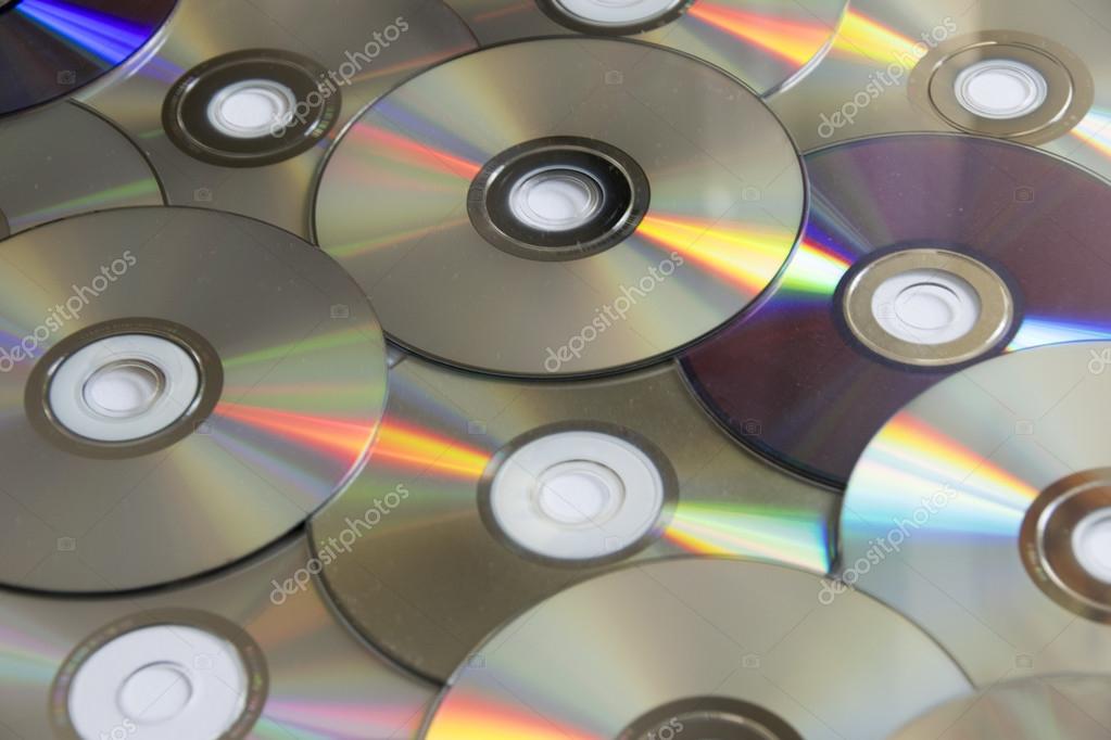 CD and DVD background Stock Photo by ©shony@post.cz 120153906