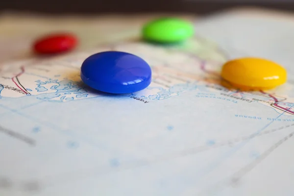 Travel destination points on a map indicated with colorful thumbtacks ...