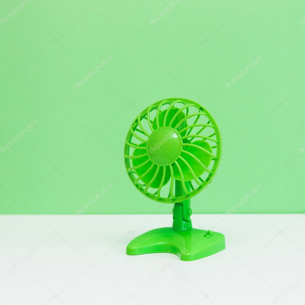 Green desktop ventilator Stock Photo by ©Katya_Havok 118374080
