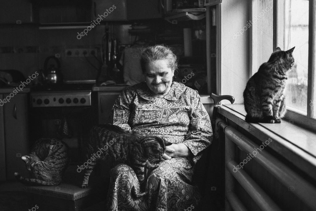 Old Woman With Cats