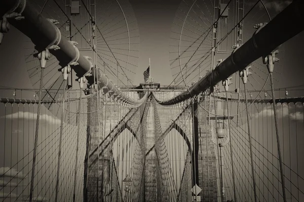 Walking across the Brooklyn Bridge for the first time on a sunny summer ...
