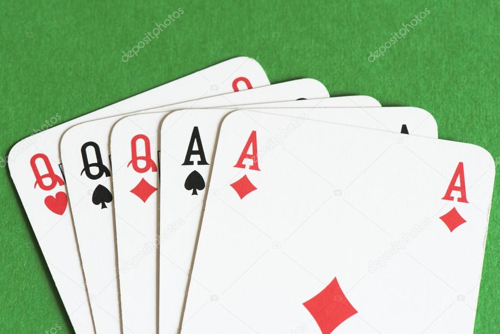 Playing card on green table, Full house — Stock Photo © robertacanu ...