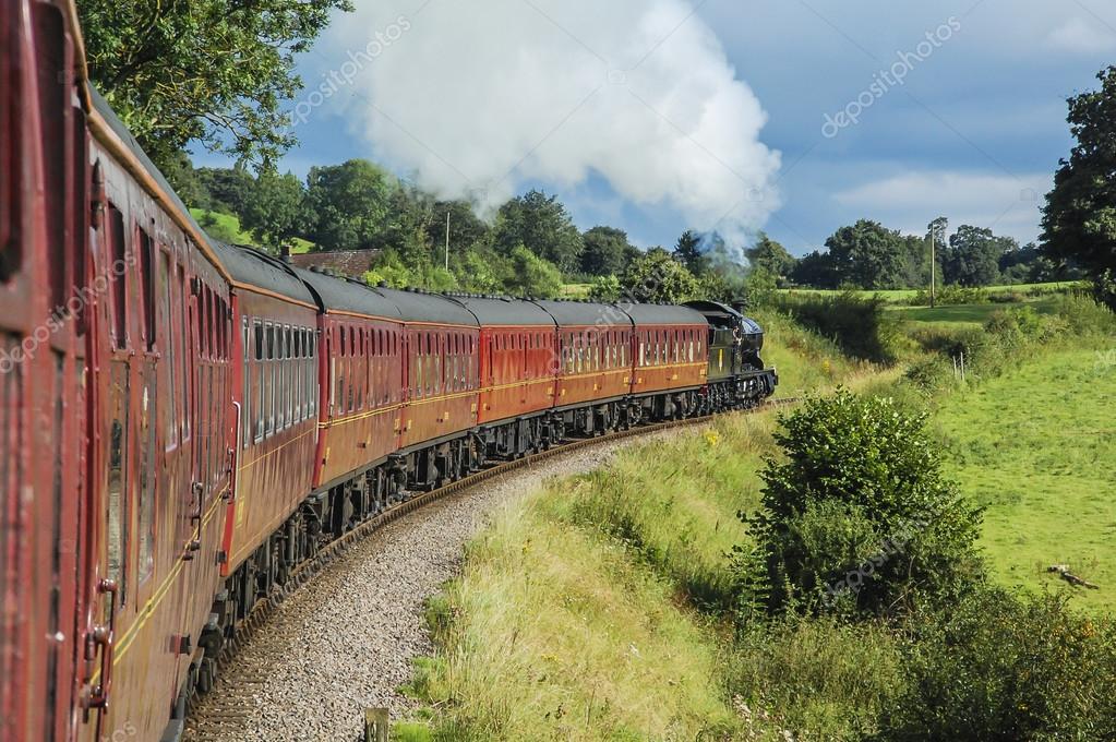 Steam Train Pulling Passenger Cars Stock Photo by ©rickdeacon 117482202