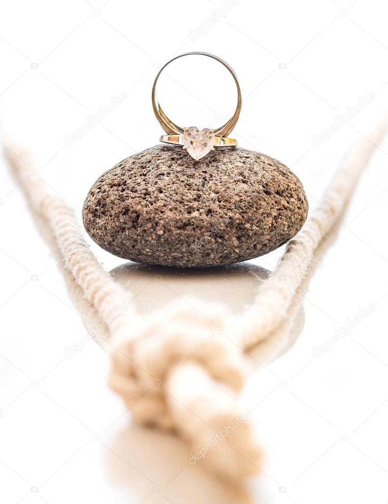 Wedding rings on a stone with rope knot Stock Photo by ©Twenty2Photo ...