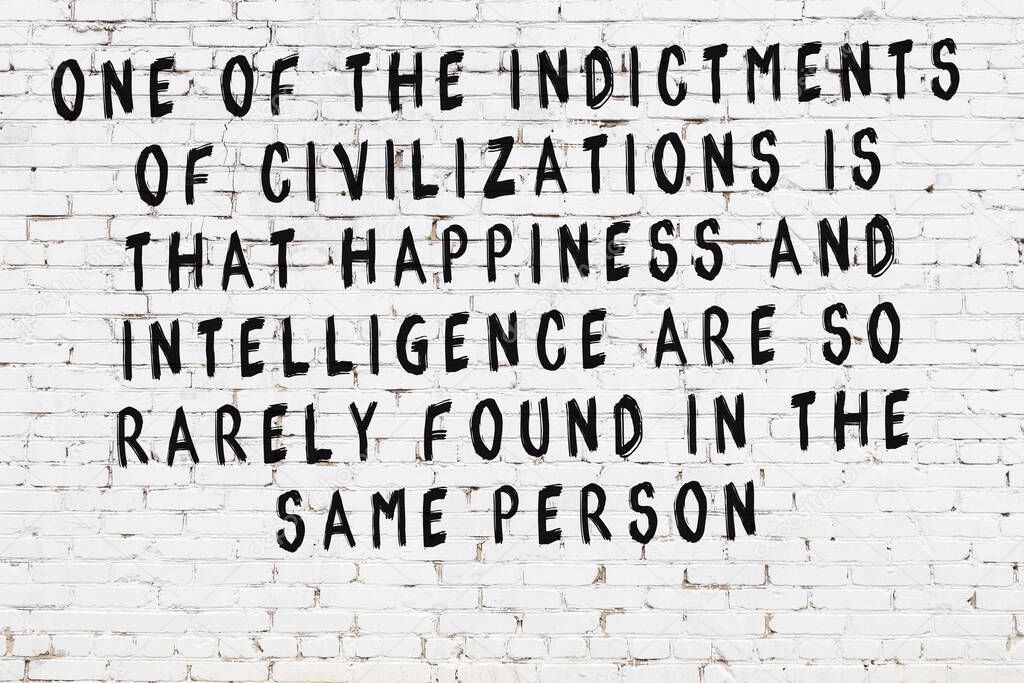 Pared de ladrillo blanco con inscripción negra pintada de sabia cita ...