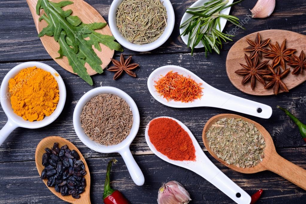 Powder spices & herbs on spoons Stock Photo by ©8r1n31k2010 117001108