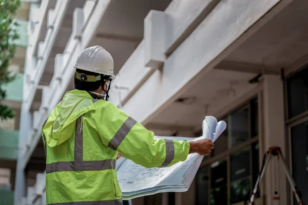 Civil Engineering people wearing face mask and safety helmet on ...