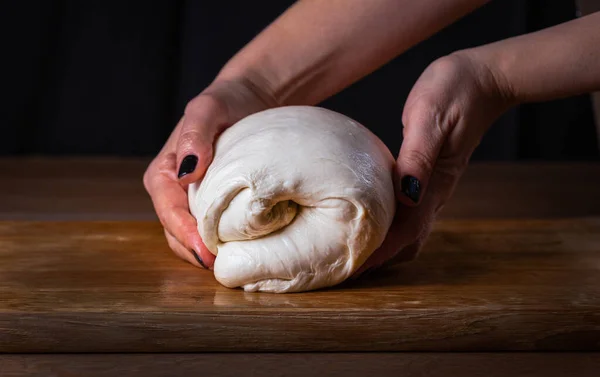 Kneading the dough using the stretch and fold method. Sourdough wheat ...