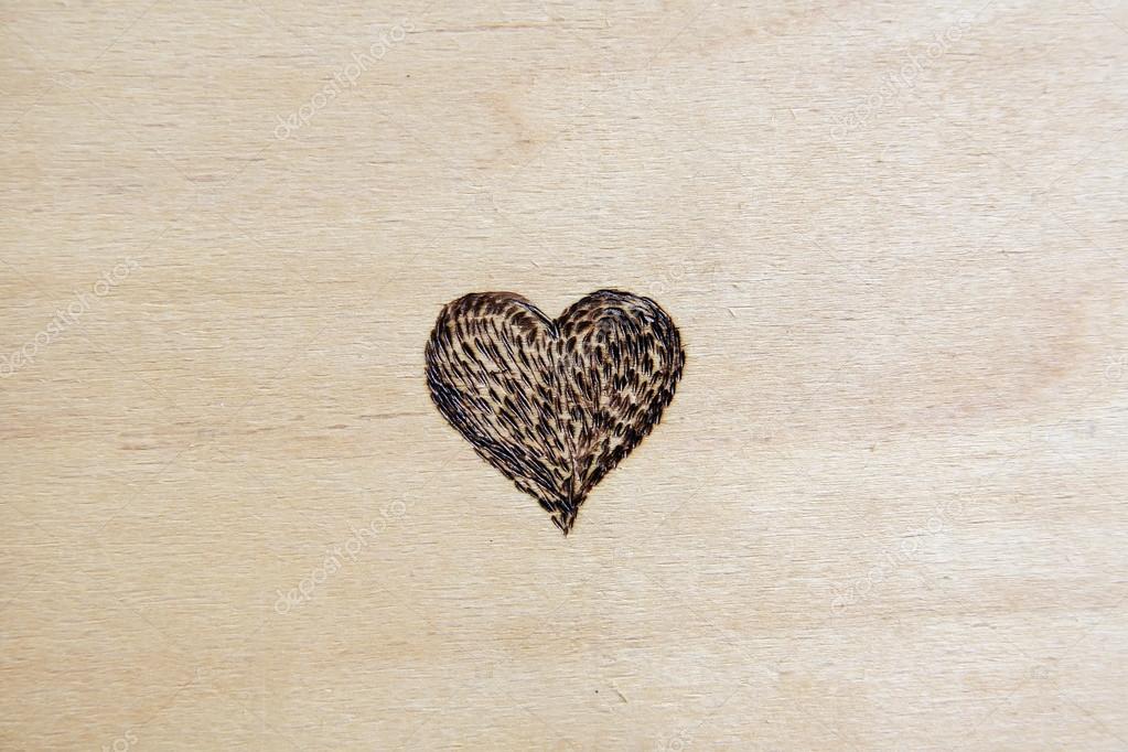Heart. Woodburning, pyrography. — Stock Photo © angel648@mail.ru #122623878
