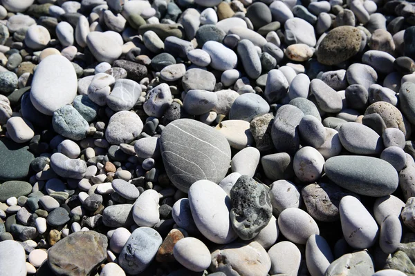 Smooth sea pebbles Stock Photos, Royalty Free Smooth sea pebbles Images ...