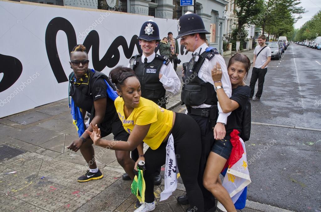 Policeman taking part in Notting Hill Carnival dancing with festival ...