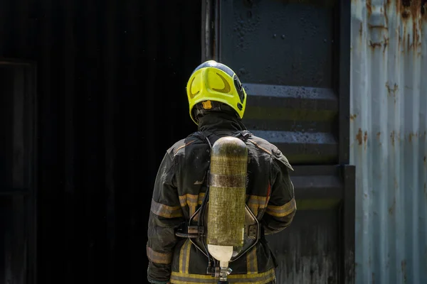 Fireman Wearing Suit Safety Using Water Extinguisher Fighting Fire ...