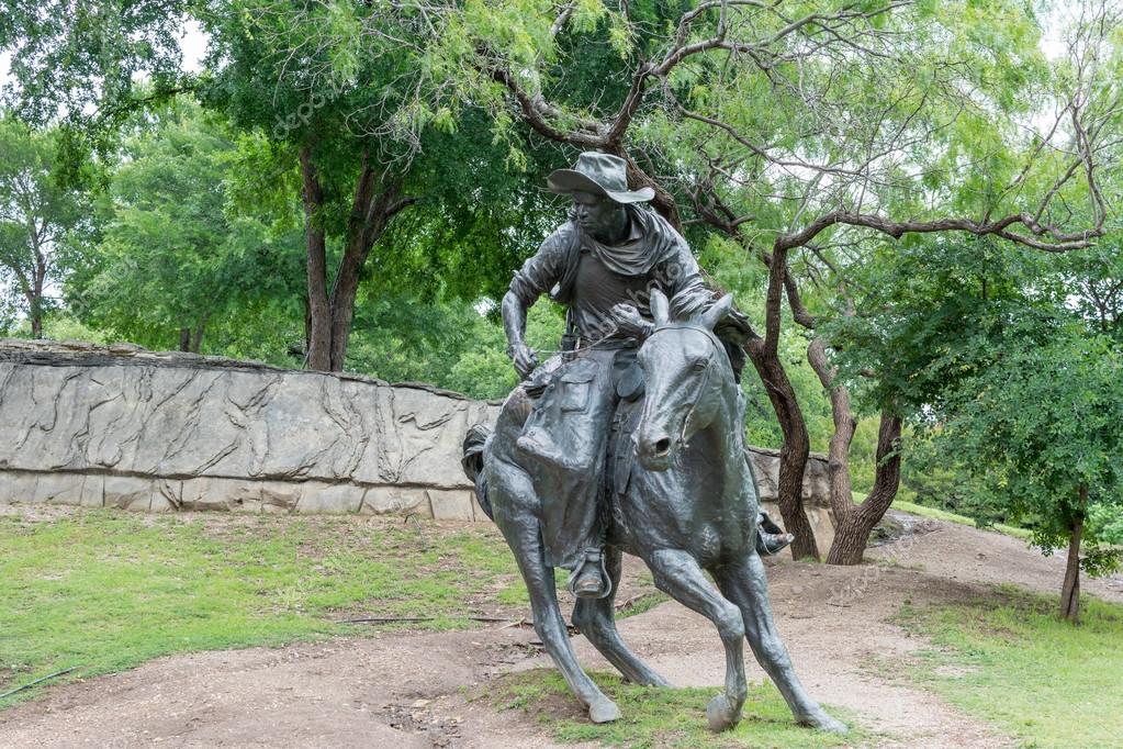 Bronze Cowboy sculpture Stock Photo by ©VictorJiang 123721920
